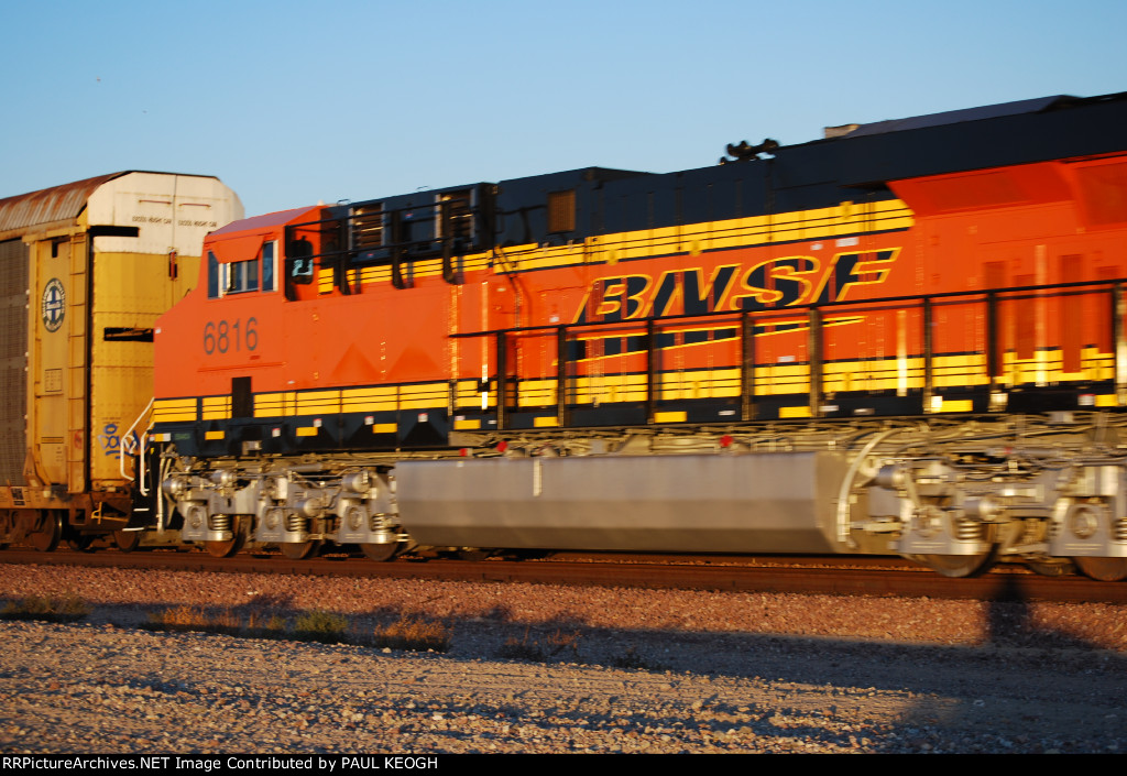BNSF 6816 the Newest C4 todate I've photographed rolls east as the Rising Sun Reflects off Her 8 ...